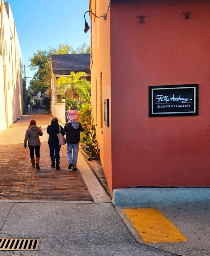 Phillip Anthony's Signature Gallery: where art meets history in a salmon-colored embrace.