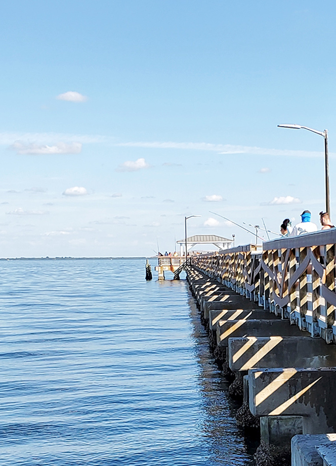 The wooden pier stretches toward the horizon, a testament to our eternal desire to venture just a little further into the beautiful unknown.