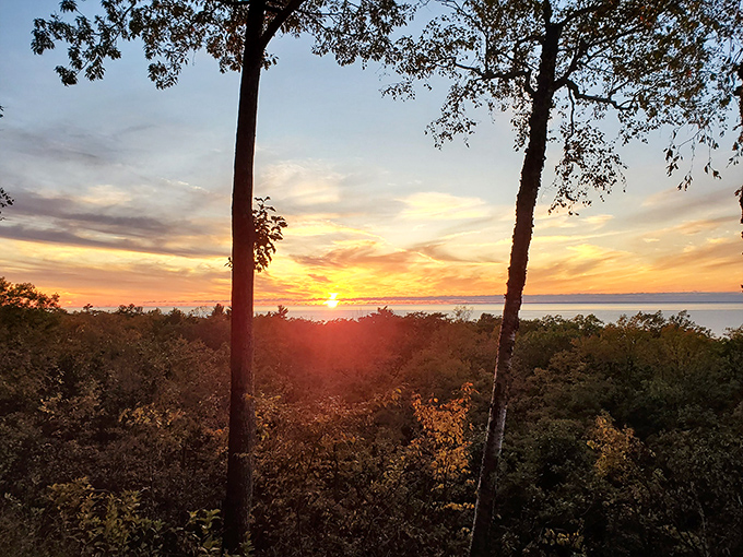 Day's end brings golden hour magic to the shoreline, where Lake Michigan sunsets paint the sky in colors no artist could fully capture. 