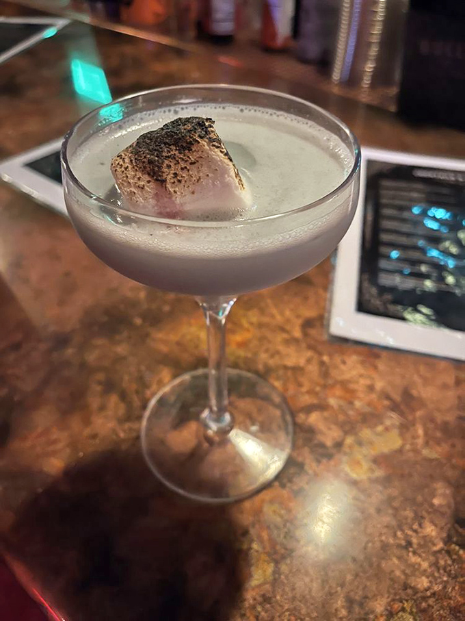 This ethereal "Supernatural" cocktail with its toasted marshmallow garnish proves that even the afterlife appreciates a good s'more now and then.