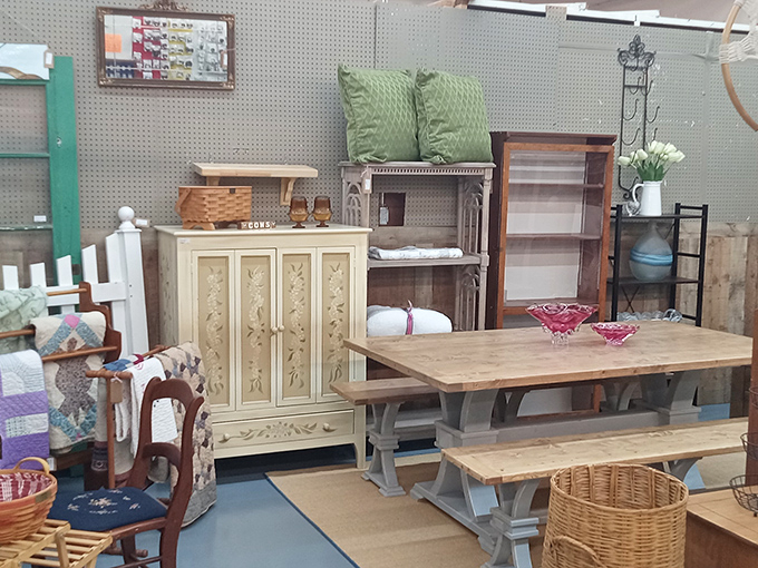 This farmhouse-style vignette could inspire an entire home makeover, with its perfectly weathered furniture and country-chic accessories ready for a new life.