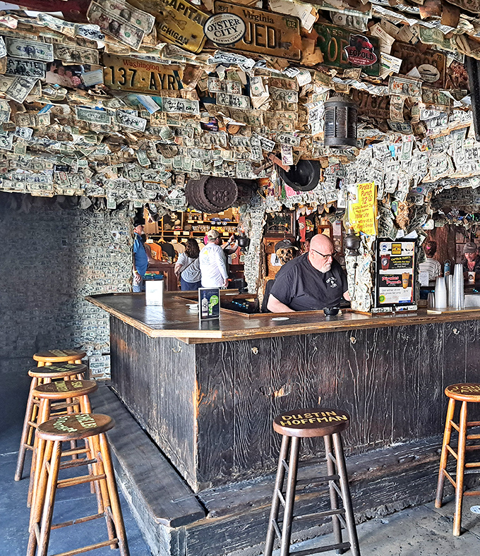The wooden bar has supported the elbows of everyone from local fishermen to international celebrities seeking authentic Key West spirit.