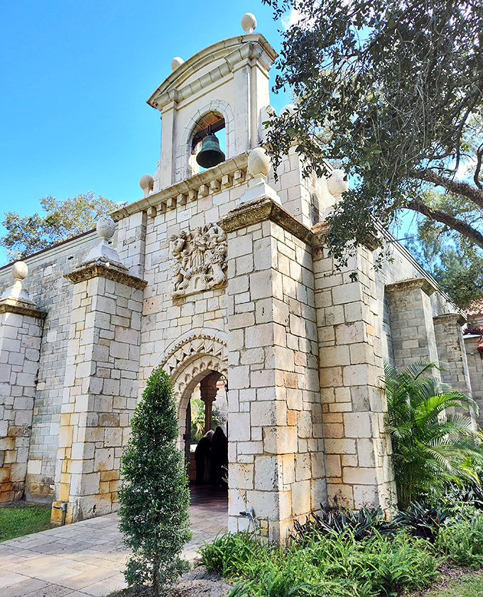 The bell tower reaches skyward, a stone finger pointing to heaven, reminding Miami there's something higher than luxury condos.
