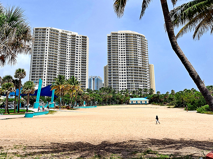 Modern luxury meets beachfront paradise where high-rise condos offer balcony views that make morning coffee taste infinitely better.