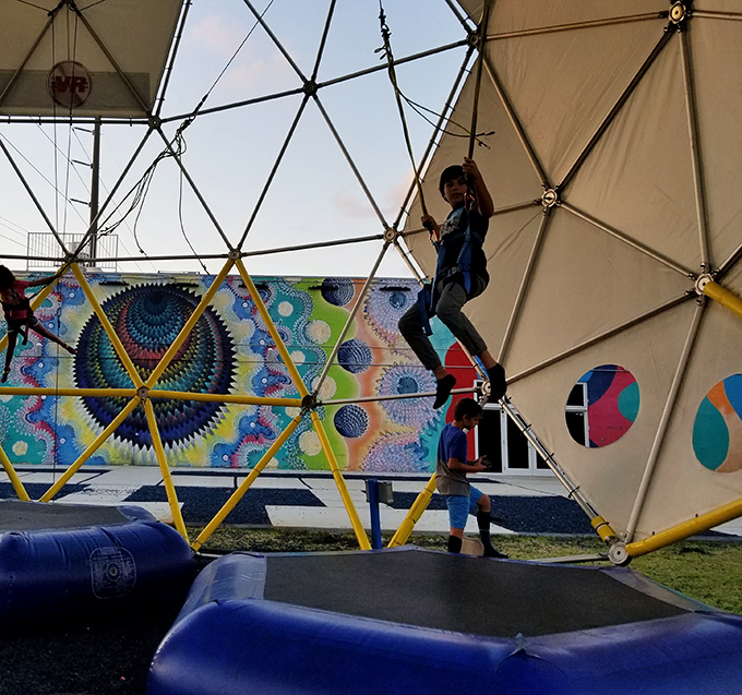 The bungy dome combines the best of trampolines and bungee cords, creating a bouncy paradise where gravity becomes merely a suggestion.