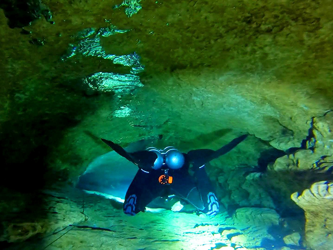 Not your average swimming pool maintenance guy &ndash; cave divers at Peacock Springs navigate an underwater maze few will ever see.