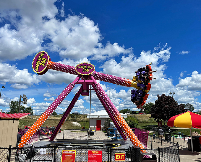 The Dragon Frenzy 360 swings riders through Wisconsin skies, transforming ordinary folks into temporary astronauts with extraordinary screaming abilities.