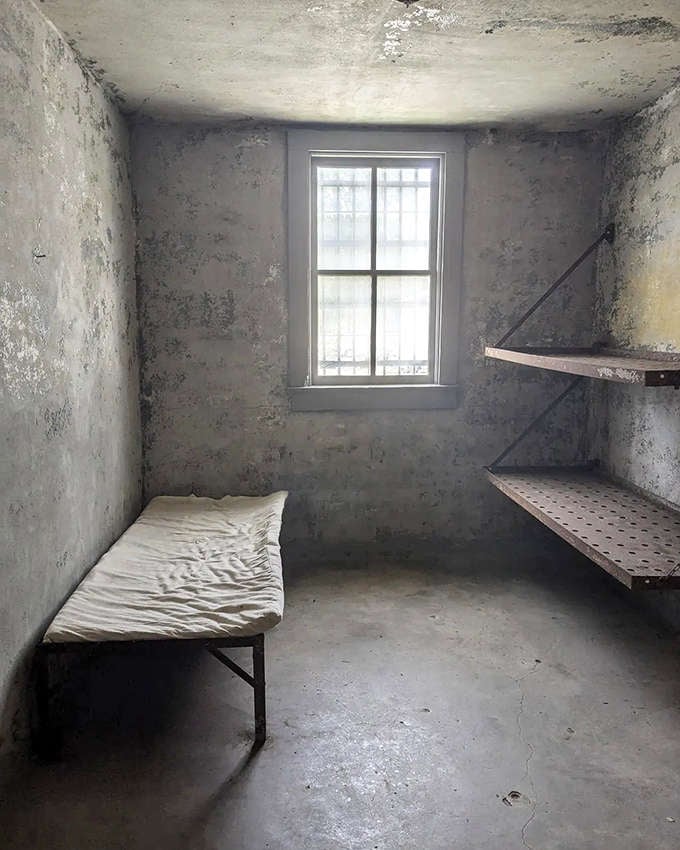 Behind these bars, time moved differently, each minute stretching like taffy at a county fair nobody wanted to attend.