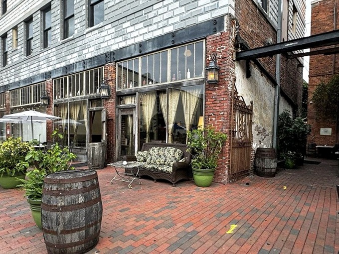 Step outside to discover the speakeasy's secret courtyard &ndash; brick-lined charm where cocktails taste even better under Florida skies.