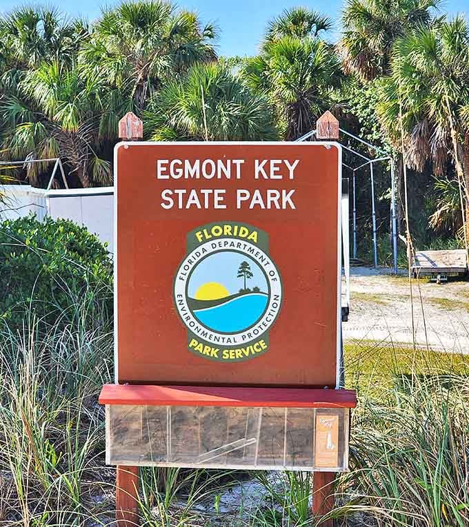 The welcoming sign stands amid native flora, officially announcing you've arrived somewhere special &ndash; Egmont Key State Park.