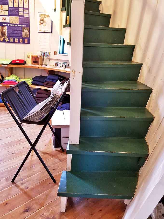 These green and white striped stairs lead upward like something from a Dr. Seuss book, proving functional can also be whimsical.