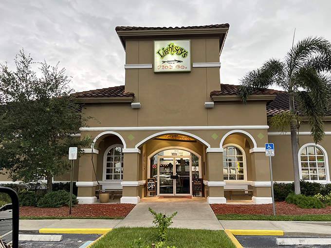 Lightsey's elegant tan building with arched windows brings unexpected sophistication to Lake Okeechobee's shores.