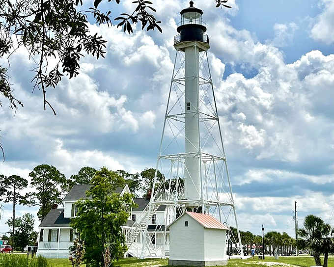 The sunset transforms Cape San Blas Lighthouse into a silhouette against pastel skies, creating a magical moment where Florida's natural beauty meets maritime history.