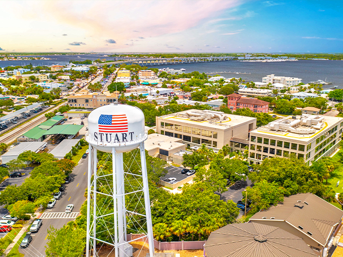 Stuart's iconic water tower stands proud against a pastel sky, welcoming visitors to Florida's happiest seaside town.