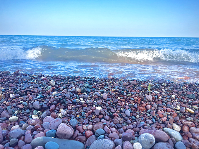 Nature's jewelry box spilled open: Lake Superior's waves polish these colorful stones to perfection, creating a treasure hunter's paradise.