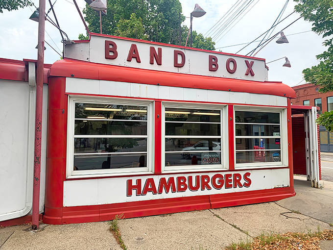 The iconic red and white exterior of Band Box Diner stands like a time capsule on the Minneapolis corner, beckoning hungry passersby with nostalgic charm.