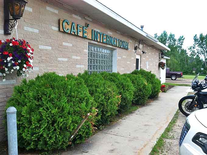 The unassuming exterior of Caf&eacute; International belies the global culinary adventure waiting inside, with its charming brick fa&ccedil;ade and welcoming entrance.