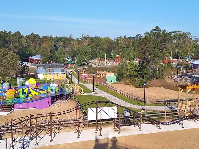 Cedar Valley's Wild Frontier Fun Park: A colorful wonderland nestled among Michigan pines, where family fun doesn't require a second mortgage or an advanced degree in line strategy.