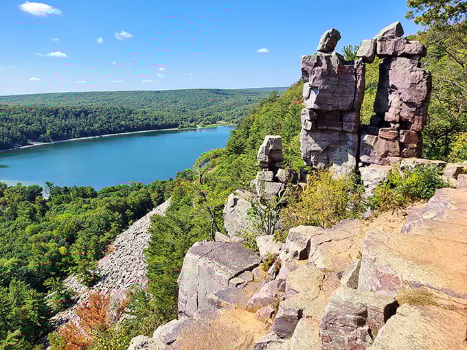 Nature's masterpiece: Quartzite bluffs frame the sapphire waters of Devil's Lake, creating a view that belongs on Wisconsin's highlight reel.