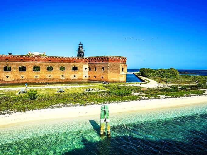 Dry Tortugas National Park rises from turquoise waters like a mirage, where 19th-century engineering meets Caribbean-worthy beaches in spectacular fashion.