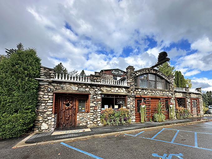 Stone meets whimsy at Legs Inn's exterior, where rustic craftsmanship creates a fairy-tale entrance to Polish culinary magic. 