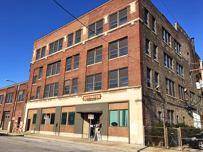 The unassuming brick exterior hides a four-story wonderland of vintage treasures waiting to be discovered.