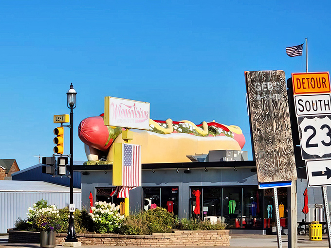 The iconic giant hot dog perched atop Wienerlicious in Mackinaw City stands as a beacon for hungry travelers &ndash; subtlety isn't on the menu here!