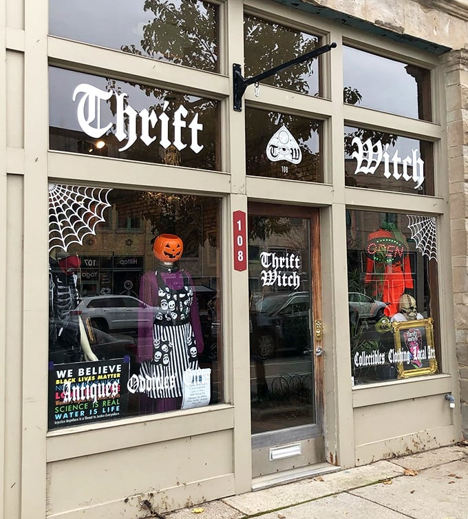 The enchanting storefront of Thrift Witch beckons with gothic lettering and spooky window displays, promising treasures for the brave at heart.