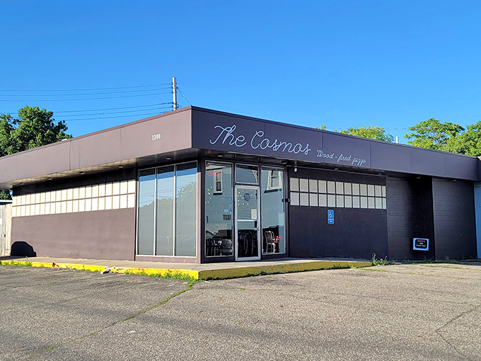 The unassuming black exterior of The Cosmos hides a universe of flavor within &ndash; like finding a culinary wormhole in Old Town Lansing.