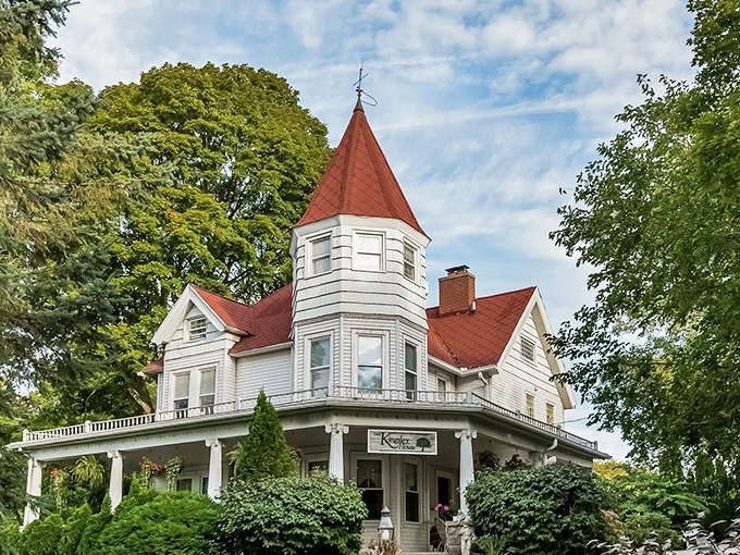 Victorian grandeur meets Midwest charm in this architectural showstopper, where that distinctive red turret practically winks at passersby.