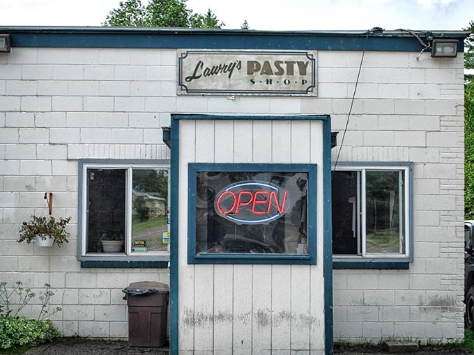 A humble white building with blue trim that houses culinary treasures worth their weight in gold.