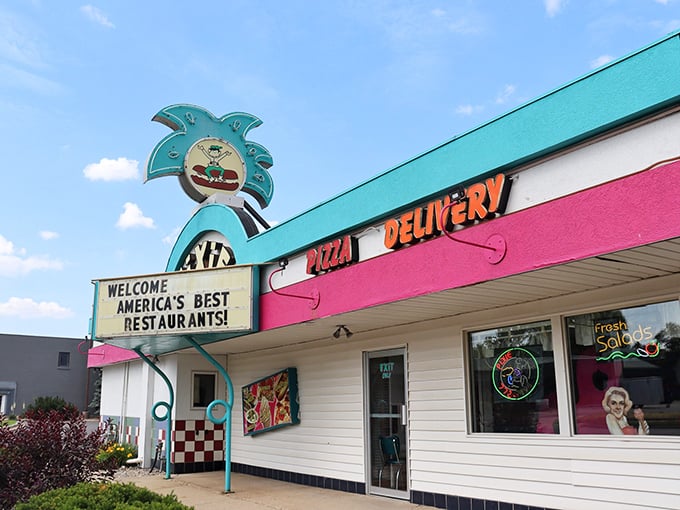 The turquoise and pink facade of Pixie Restaurant stands out like a colorful beacon of nostalgia in Mt. Pleasant.