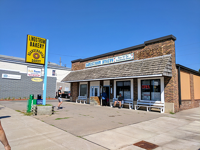 The iconic yellow sign beckons sweet-toothed pilgrims to Lindstr&ouml;m Bakery, where Scandinavian donuts have achieved legendary status in Minnesota.