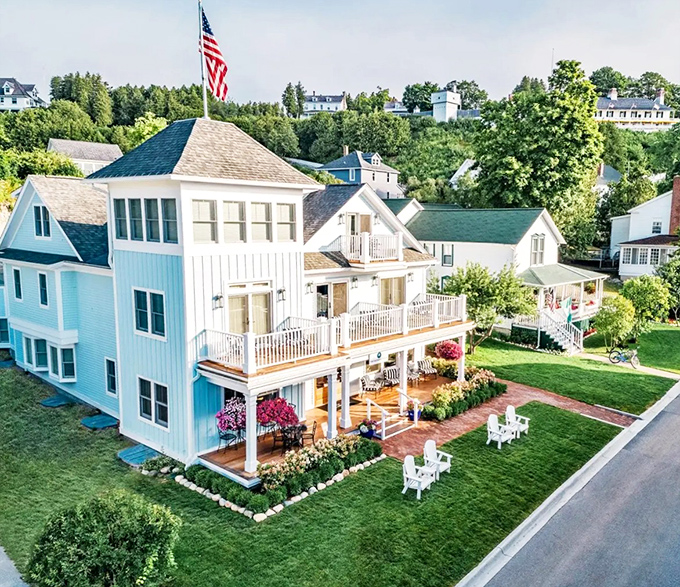 Exterior: A powder-blue Victorian dream stands proudly against Michigan's summer sky, its white trim and multiple balconies practically begging you to relax awhile.
