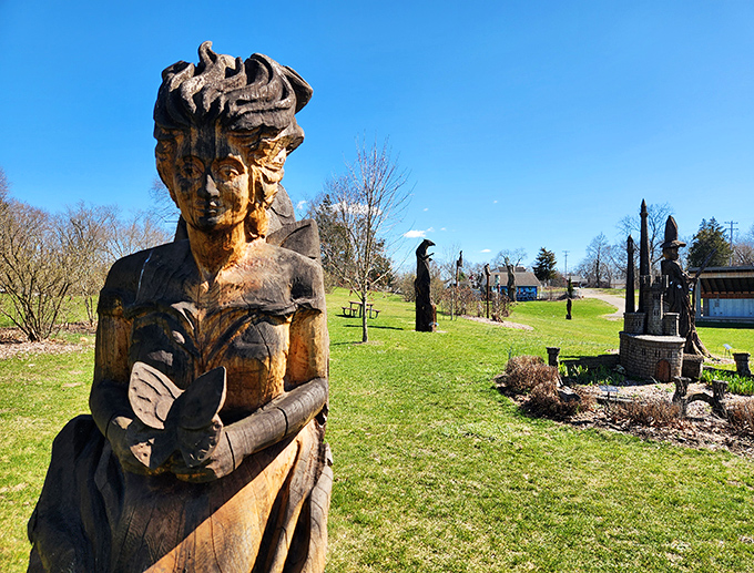 Wooden guardians stand watch at Leila Arboretum's Fantasy Forest, where dead ash trees found spectacular second lives as mythical beings.