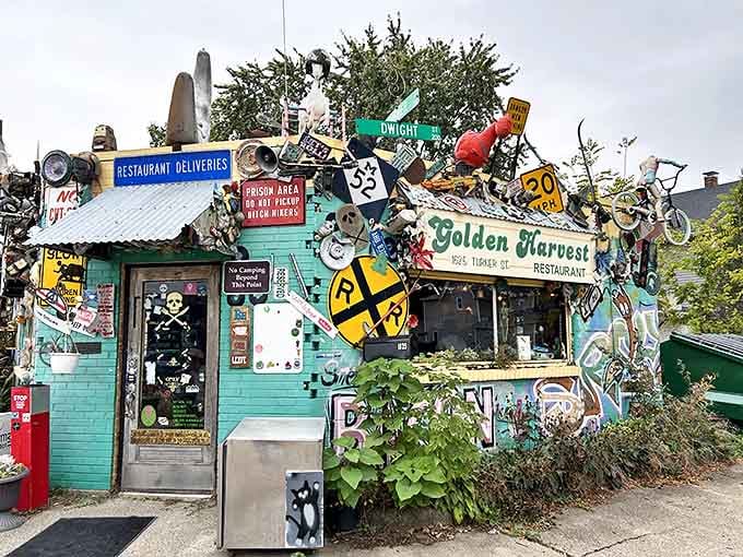 Where street signs go to retire and live their best life as part of this turquoise fever dream of a breakfast joint.