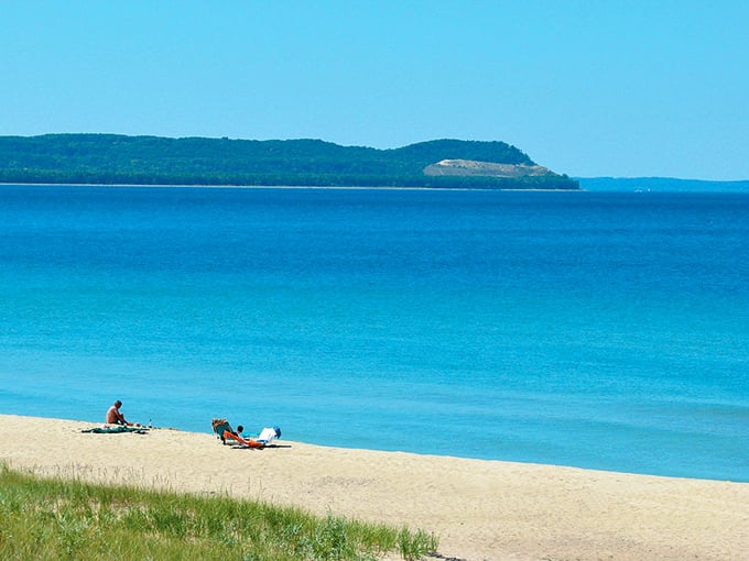 Good Harbor Bay stretches before you like a Caribbean mirage, its turquoise waters kissing golden shores beneath Michigan's big sky.