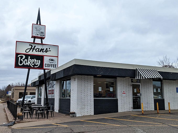 The iconic Hans' Bakery storefront stands proudly in Anoka, its vintage sign promising sweet treasures that have delighted generations.
