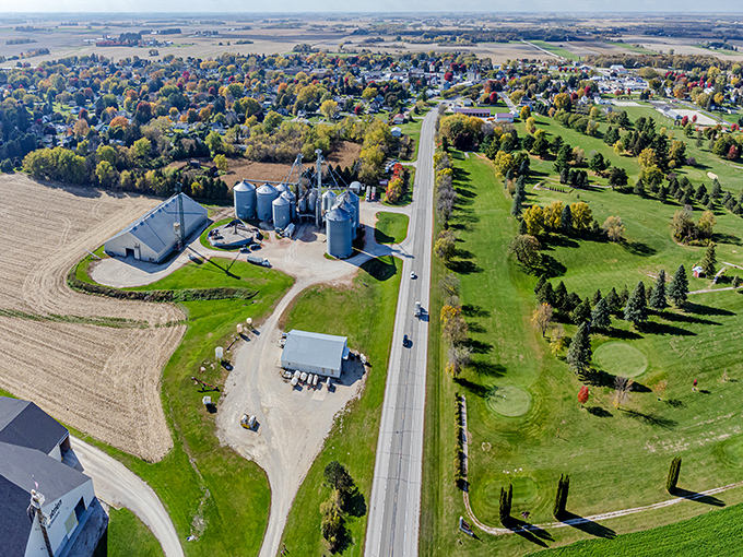 Aerial view of Harmony nestled among farmland and forests &ndash; where silos stand like silver sentinels guarding this slice of Americana.