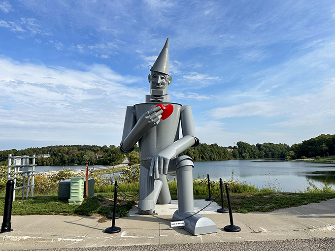 Standing proud at 24 feet tall, Hart's Tin Man gazes across the lake, his metallic heart gleaming in the Michigan sunshine.