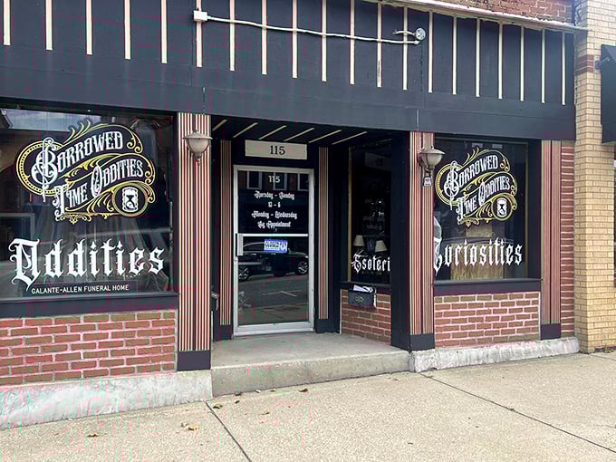 The mysterious storefront of Borrowed Time Oddities beckons with vintage lettering and a promise of strange treasures within.