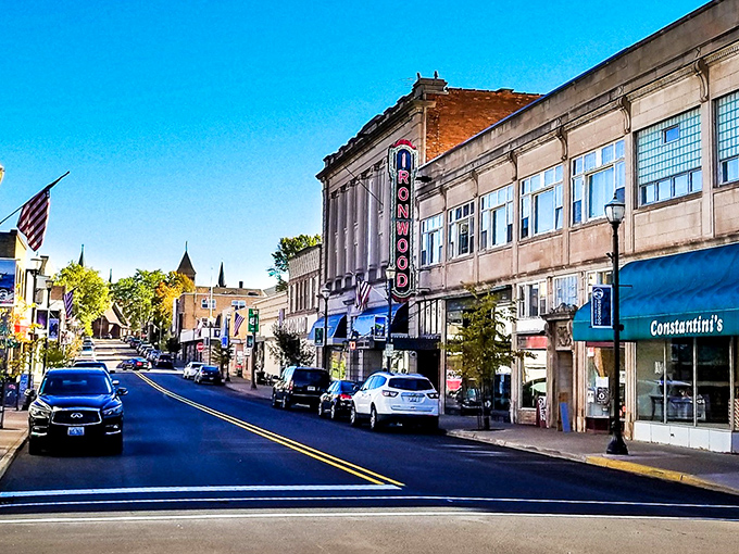 Suffolk Street stretches invitingly through downtown Ironwood, where the historic theater's neon sign promises entertainment just as it has for generations.