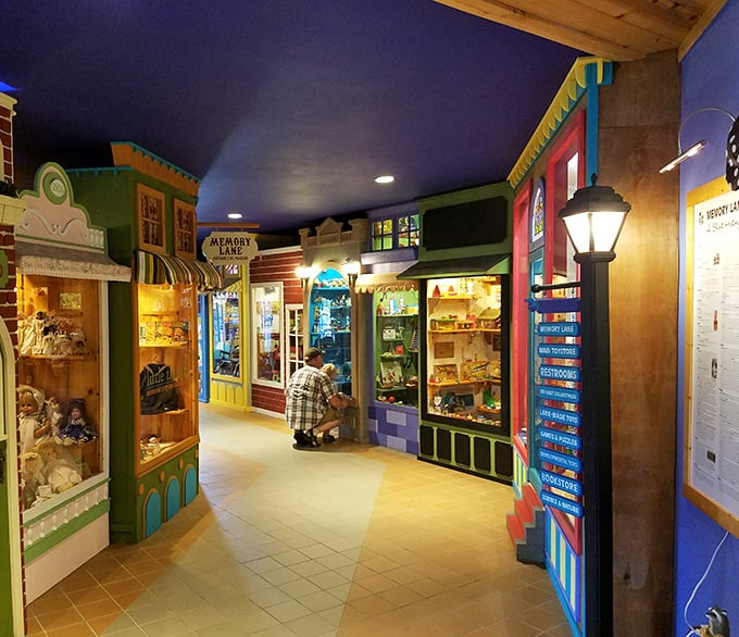 Step into a miniature village of wonder at Lark Toys, where every colorful storefront beckons with childhood treasures waiting to be discovered.