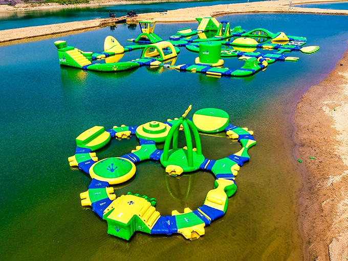 Aquatic playground heaven! Lake Arvesta's vibrant inflatables transform a Michigan lake into a bouncy wonderland where adults rediscover their inner child.