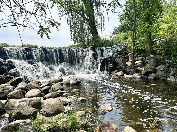 Nature's perfect cascade at Mallard Lake Trail – where water tumbles over ancient stones like it's auditioning for a spa commercial.
