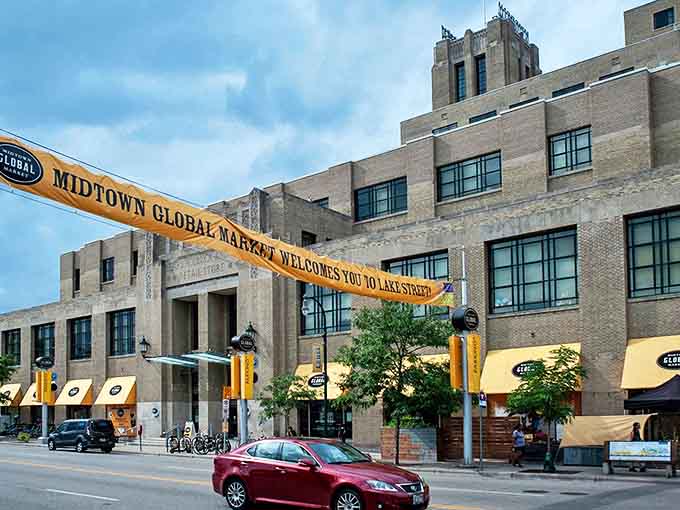 The historic Midtown Exchange building stands proudly on Lake Street, its yellow awnings beckoning like culinary lighthouses guiding hungry travelers home.