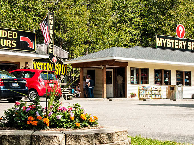 The Mystery Spot welcomes curious minds with its iconic signage and charming entrance &ndash; where normal rules of physics need not apply!