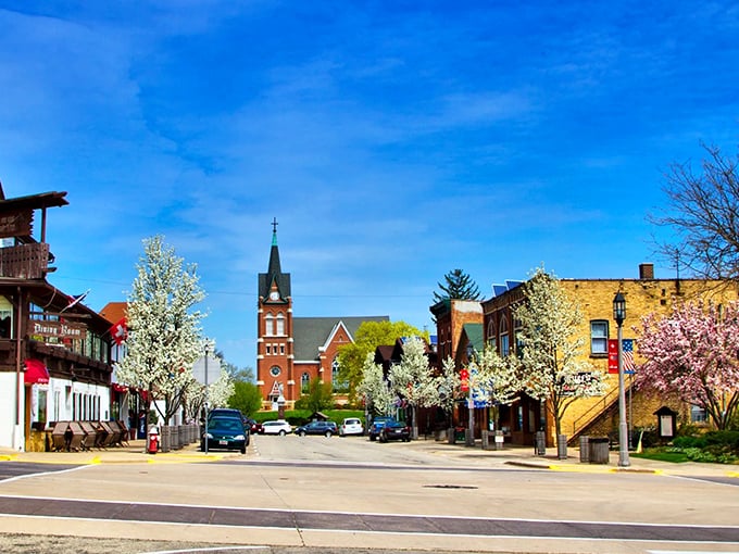 New Glarus, Wisconsin: Where cherry blossoms frame a postcard-perfect downtown that makes you question whether you've accidentally crossed the Atlantic into Switzerland.