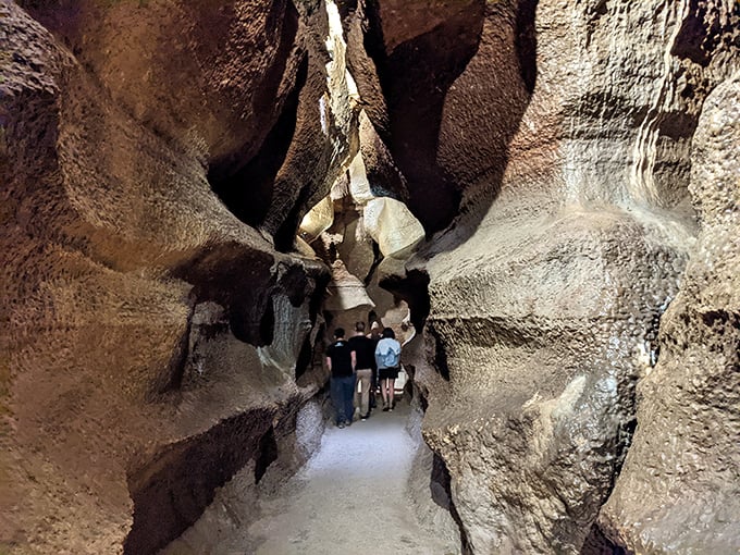 Narrow limestone passages beckon visitors deeper into Niagara Cave, where ancient rock formations create an otherworldly atmosphere.