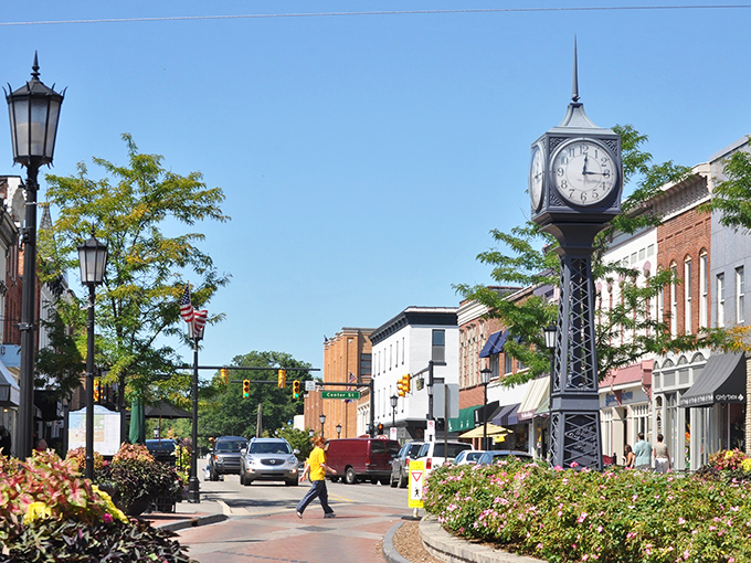Northville's iconic clock tower stands sentinel over Main Street, where time slows down and charm speeds up.